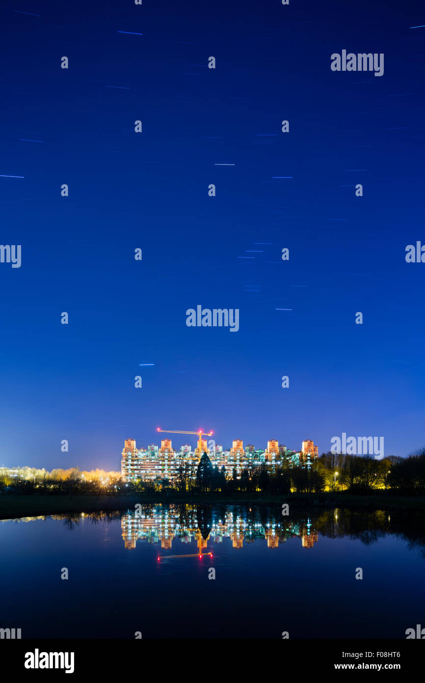 The University Hospital (Uniklinik) Aachen at night with reflection in ...