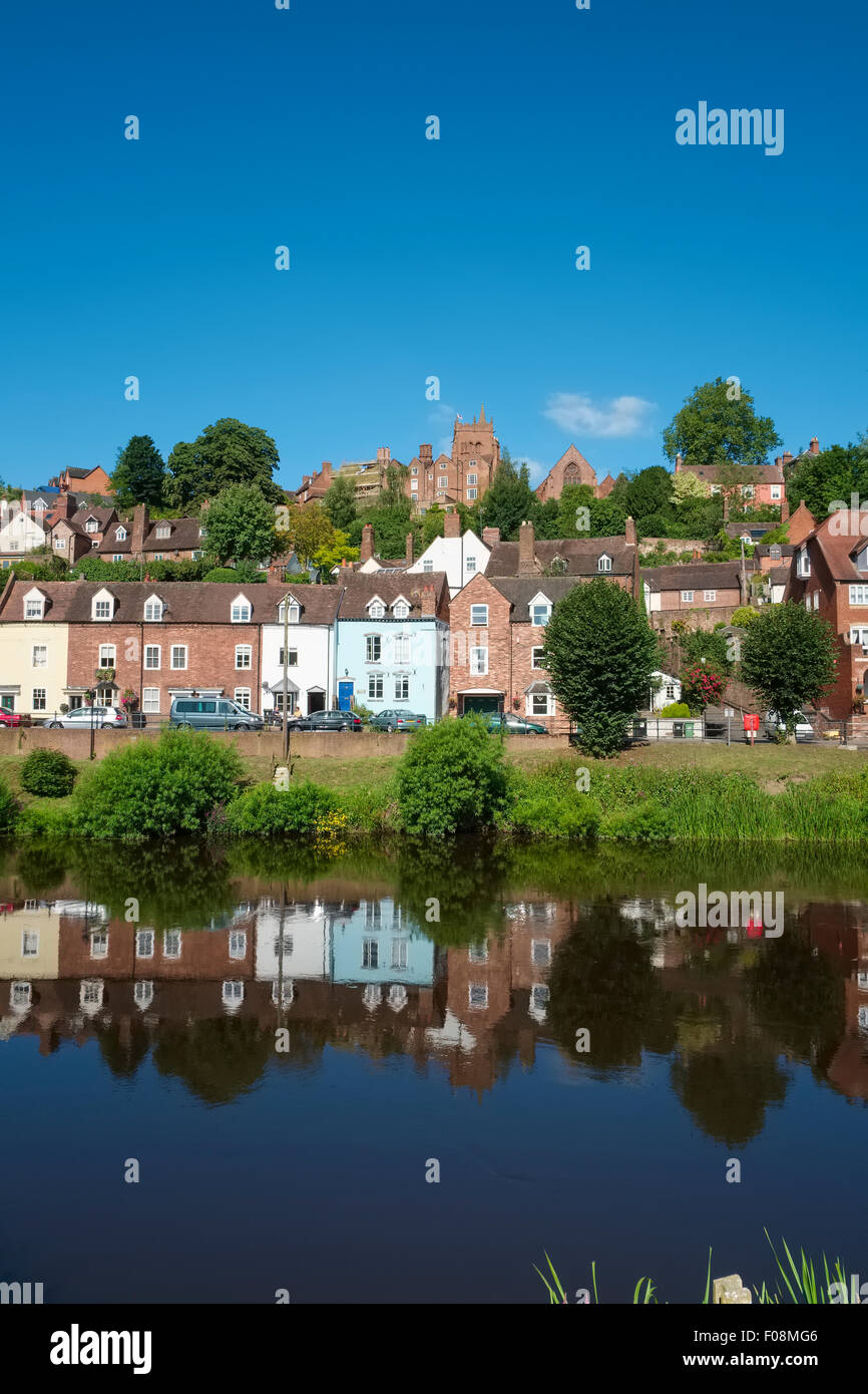 Riverside houses in Low Town, Bridgnorth, reflected in the River Severn ...