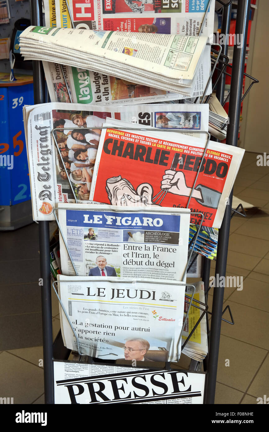 Satirical weekly news magazine Charlie Hebdo between international ...