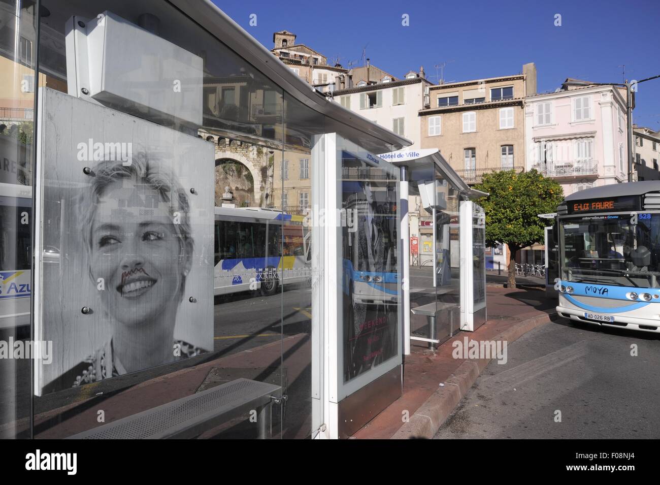 France, French Riviera, Cannes: bus stop with portraits of famous movie ...