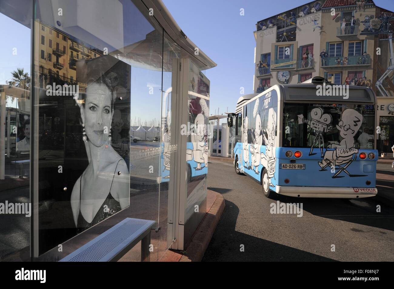 France, French Riviera, Cannes: bus stop with portraits of famous movie ...