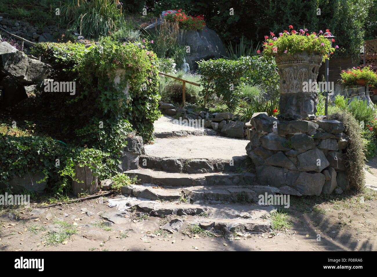 Natural stone wall stairs garden hi-res stock photography and images ...