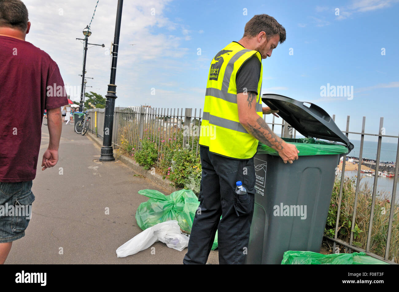 Man emptying bins hi-res stock photography and images - Alamy