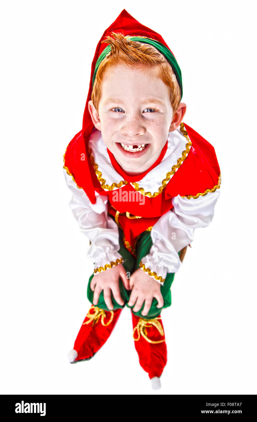 Cute boy in a Christmas Elf costume Stock Photo - Alamy
