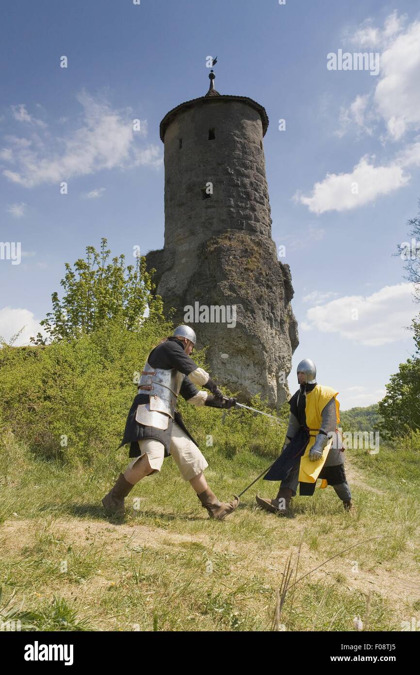 Two knights in front of small tower in Franconian Switzerland, Bavaria ...