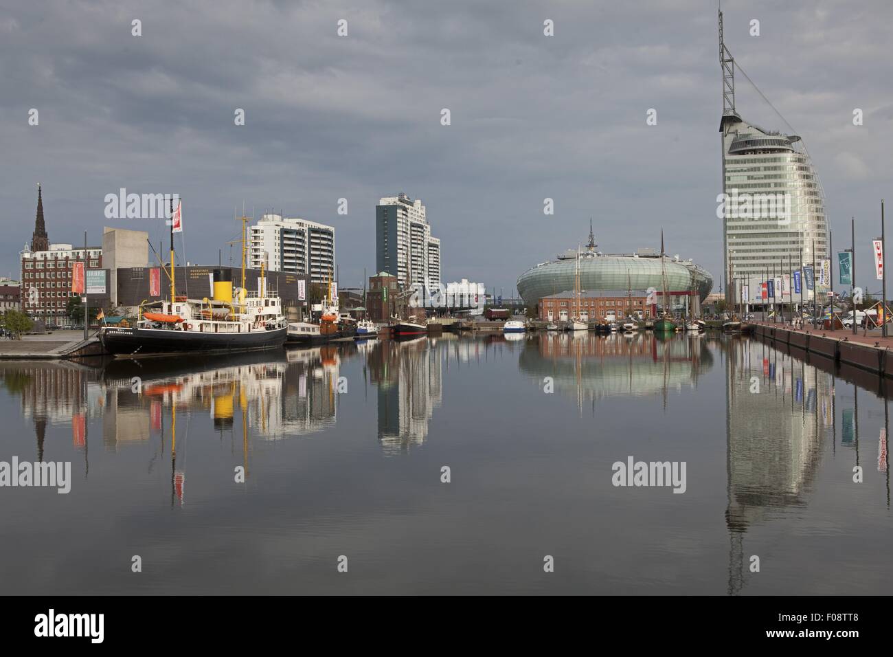 Reflection of harbour and Atlantic Hotel Sail City in sea at ...