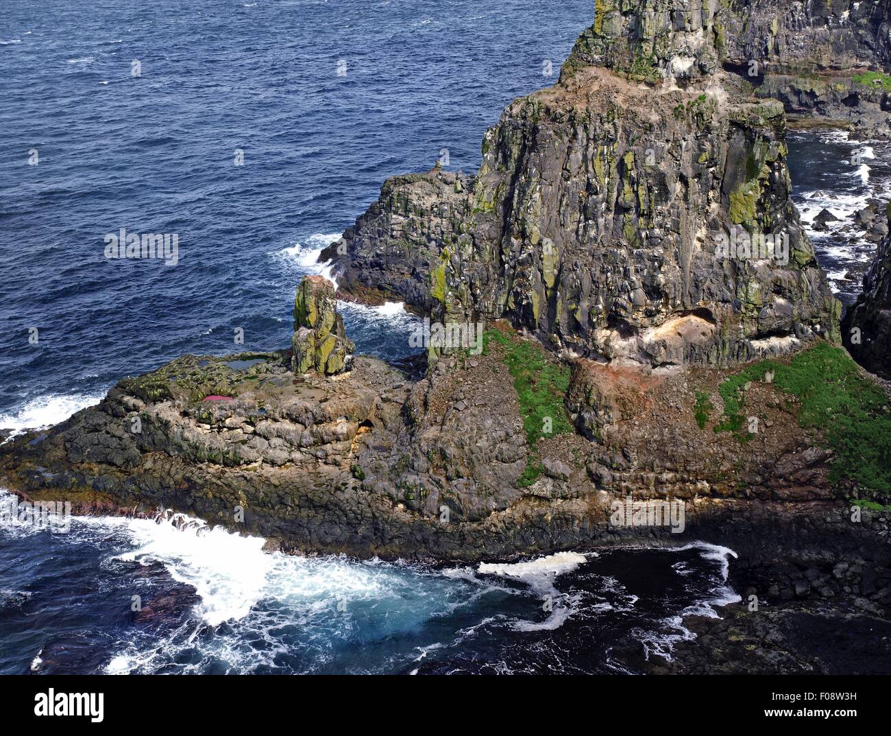View of waves splashing on rocky cliffs at Rathlin Island, Ireland, UK ...