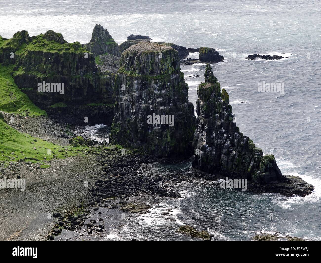 View of waves splashing on rocky cliffs at Rathlin Island, Ireland, UK ...