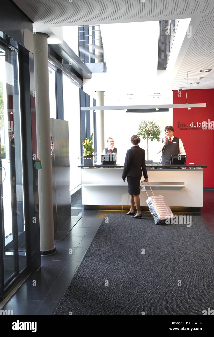 Housekeeper at room in hotel at Vaihingen, Stuttgart, Baden-Wurttemberg ...