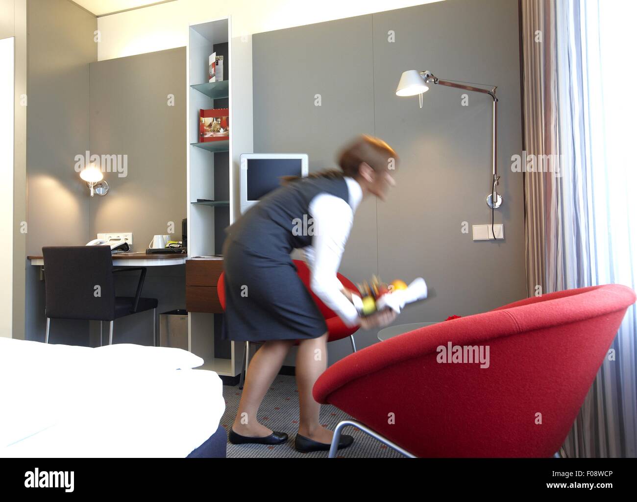 Housekeeper at room in hotel at Vaihingen, Stuttgart, Baden-Wurttemberg ...