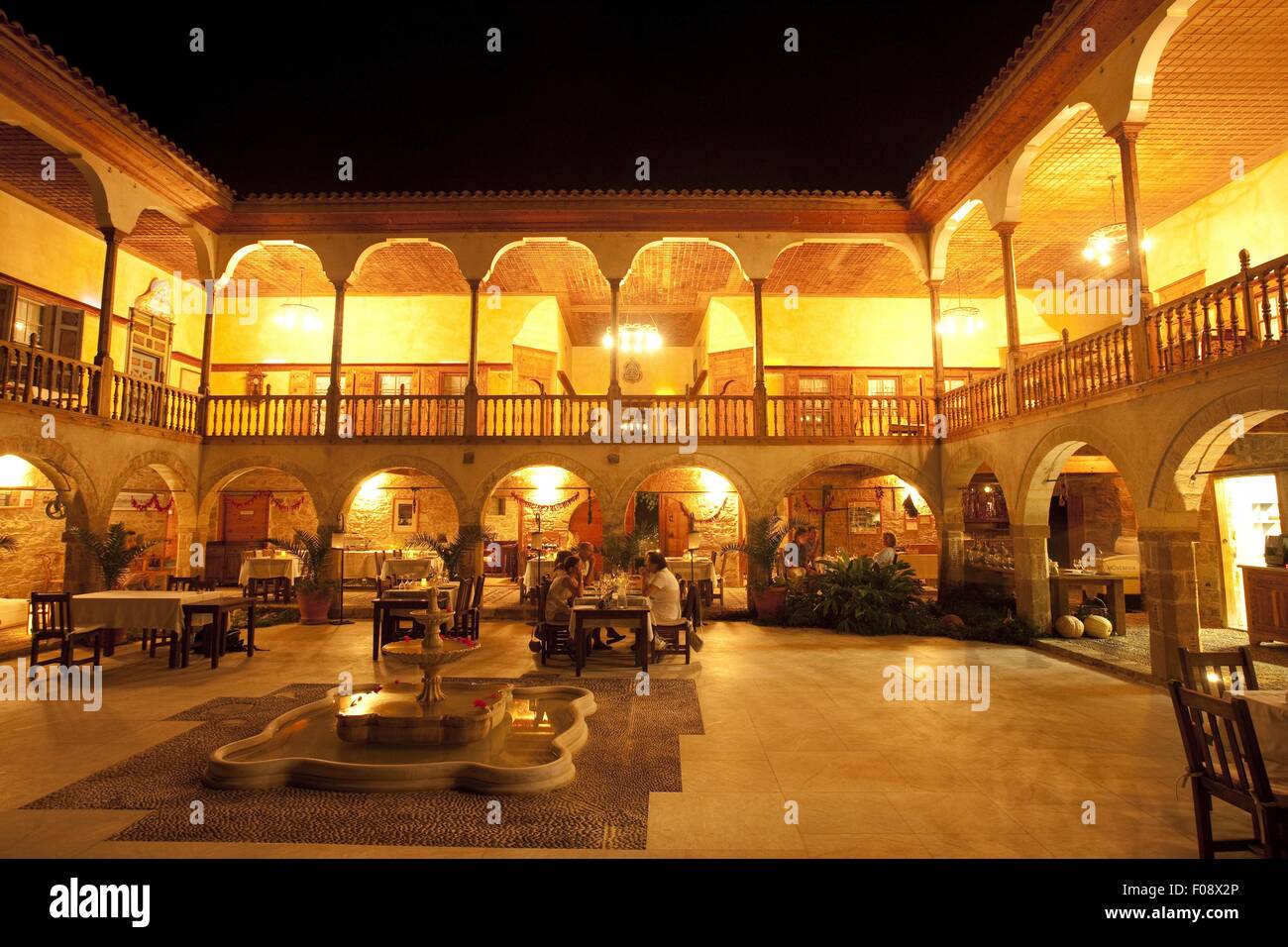 Guests sitting at table in Elaki Restaurant, Mehmet Ali Aga Mansion ...