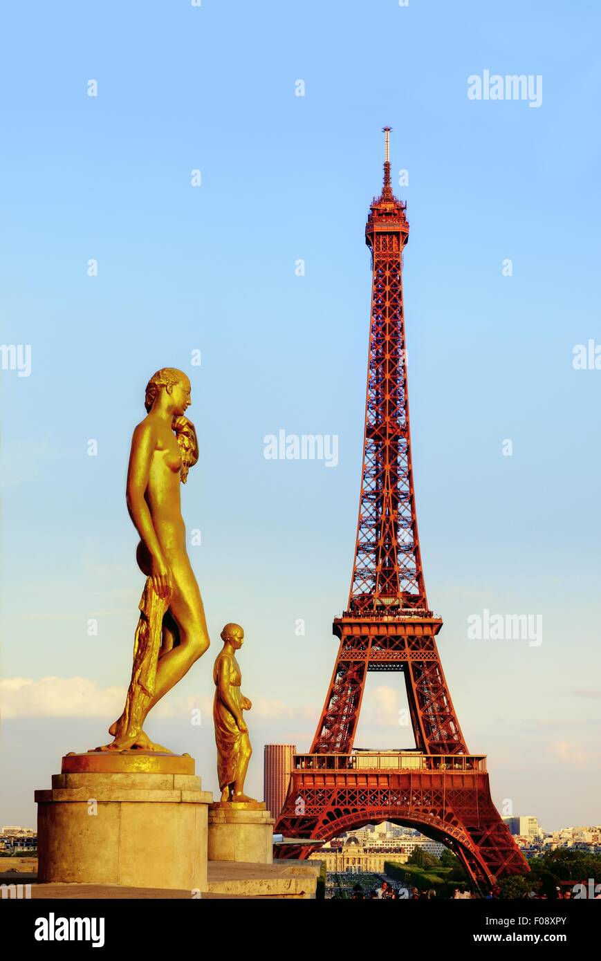 Eiffel Tower and golden statues in Paris, France Stock Photo - Alamy