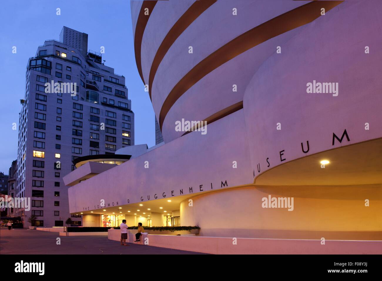 Exterior of Solomon R. Guggenheim Museum at night in New York, USA ...