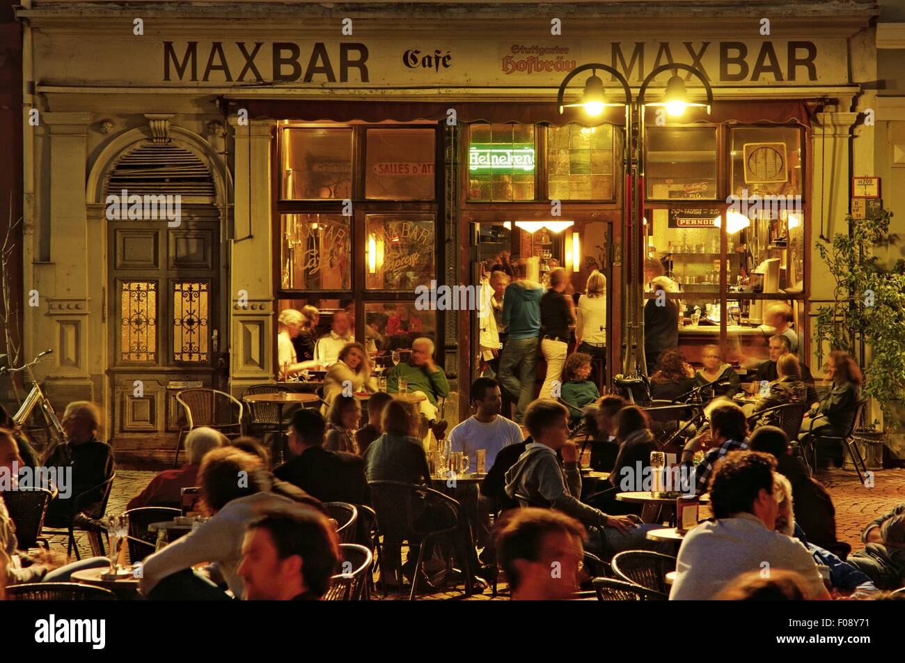 Guest sitting in Maxbar cafe in Heidelberg, Germany Stock Photo - Alamy