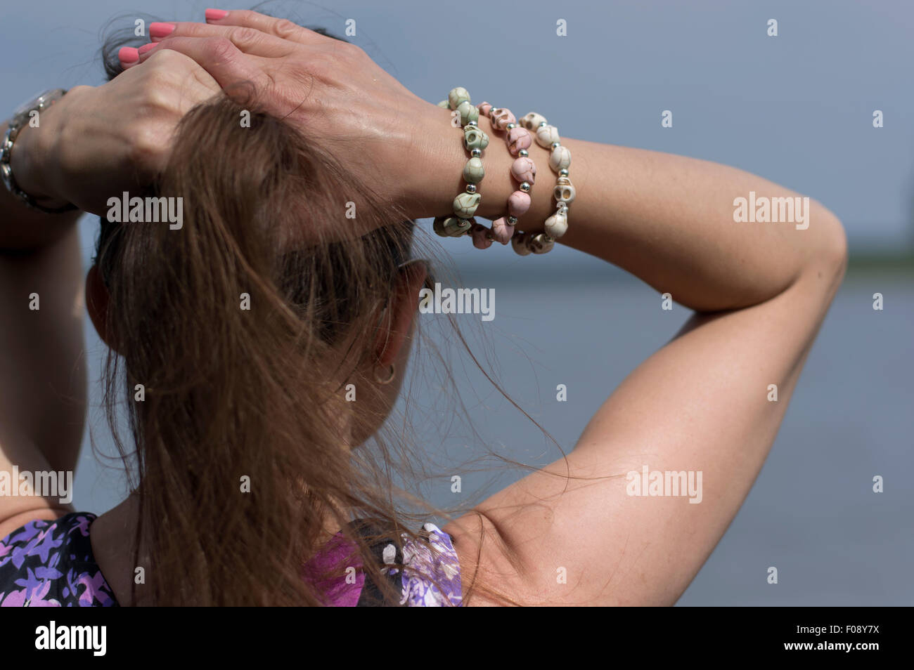 Woman looking At Water Stock Photo - Alamy