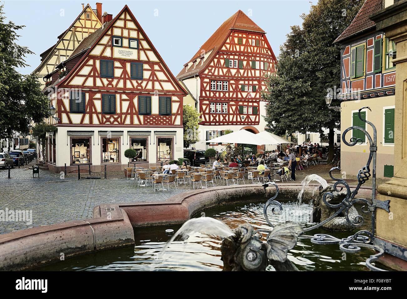 View of Market place, half-timbered houses and fountain in Ladenburg ...