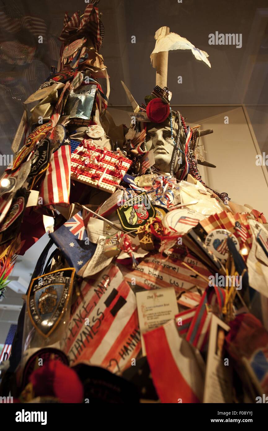 Replica of Statue of Liberty covered with flags at 9/11 Memorial Museum ...