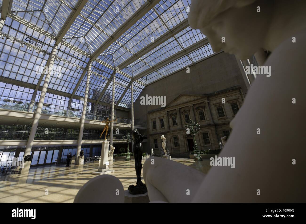 View of hall with glass roof and wall at Metropolitan Museum, New York ...