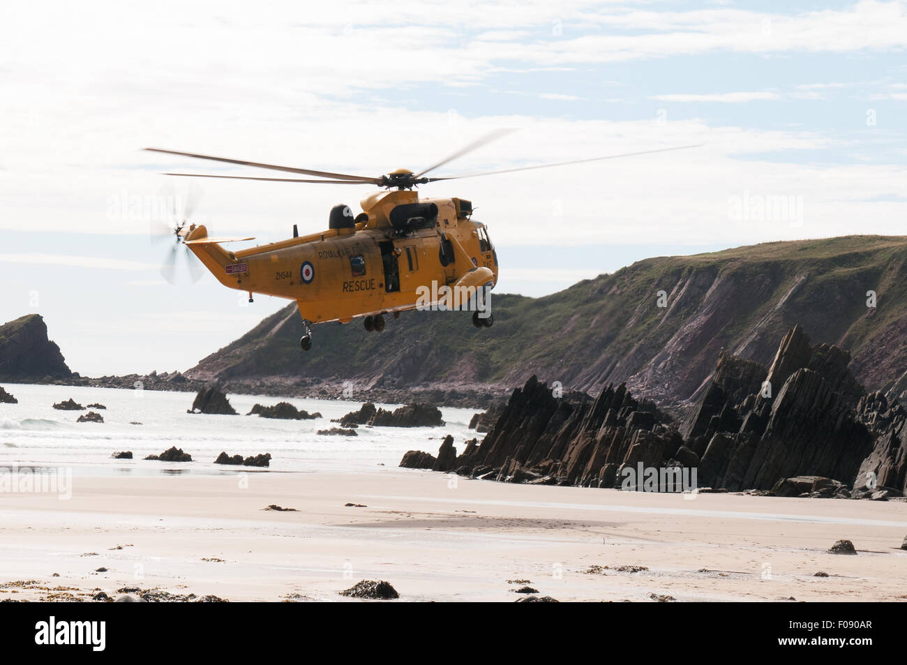Helicopter landing on a beach Stock Photo - Alamy