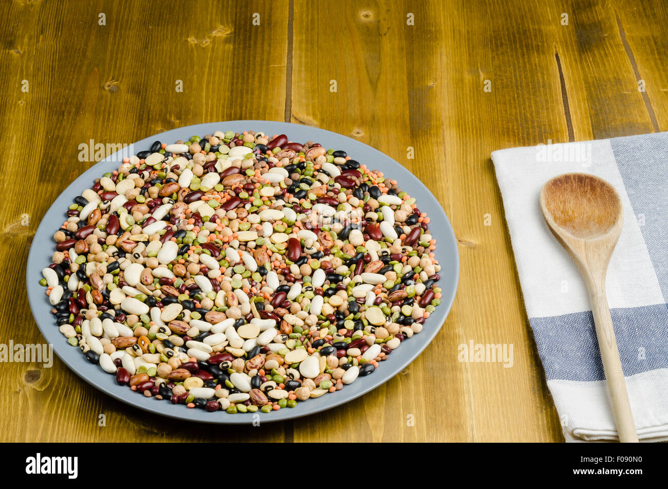 Legumes in a dish on wood hi-res stock photography and images - Alamy