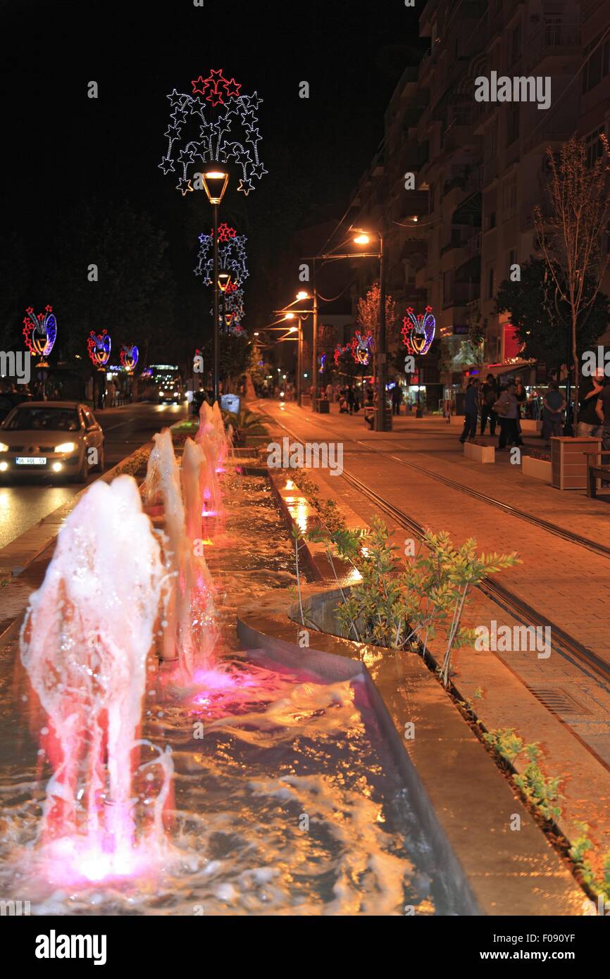 Fountains and street lights of Cetinkaya Caddesi street at night ...