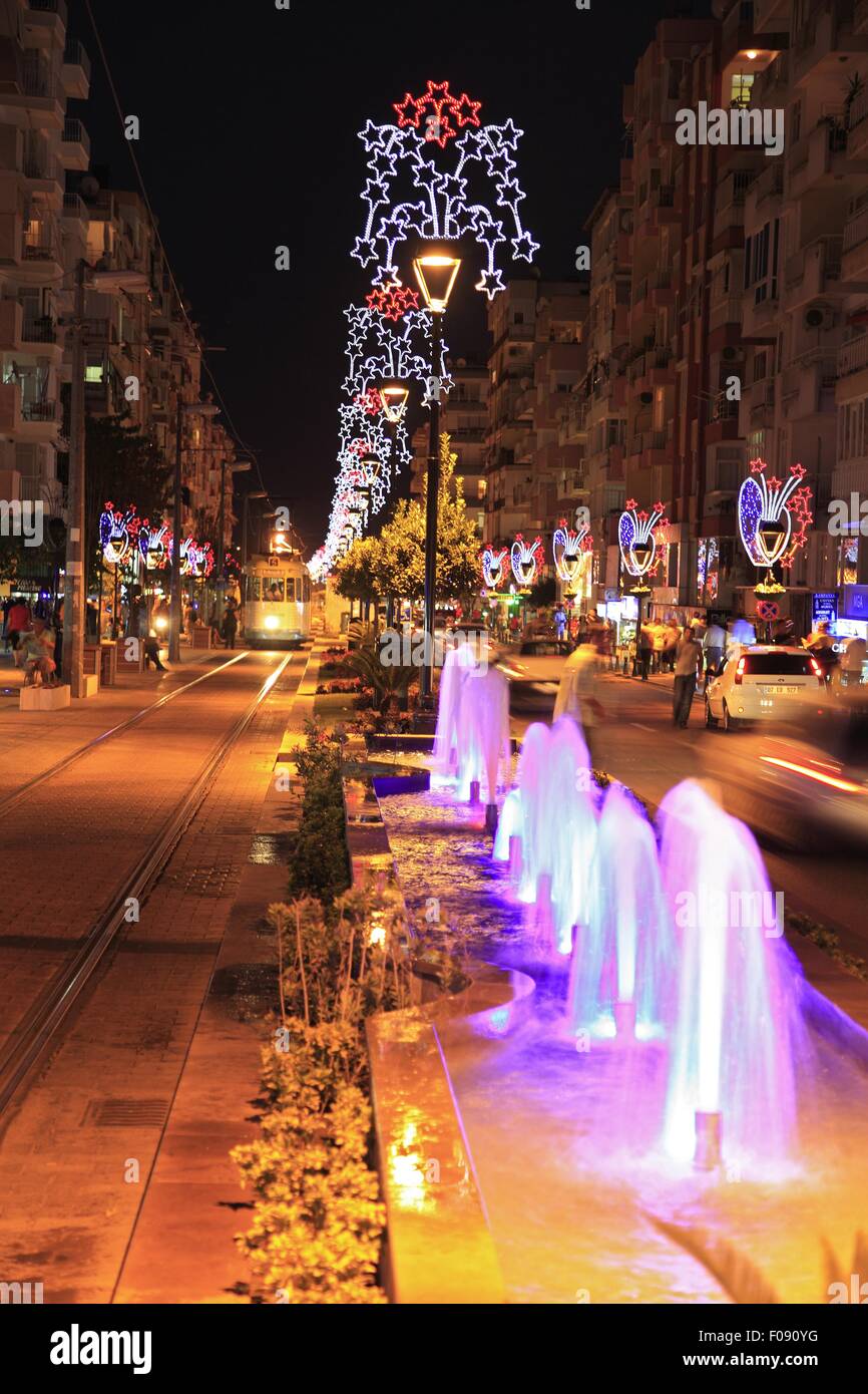 Fountains and street lights of Cetinkaya Caddesi street at night ...