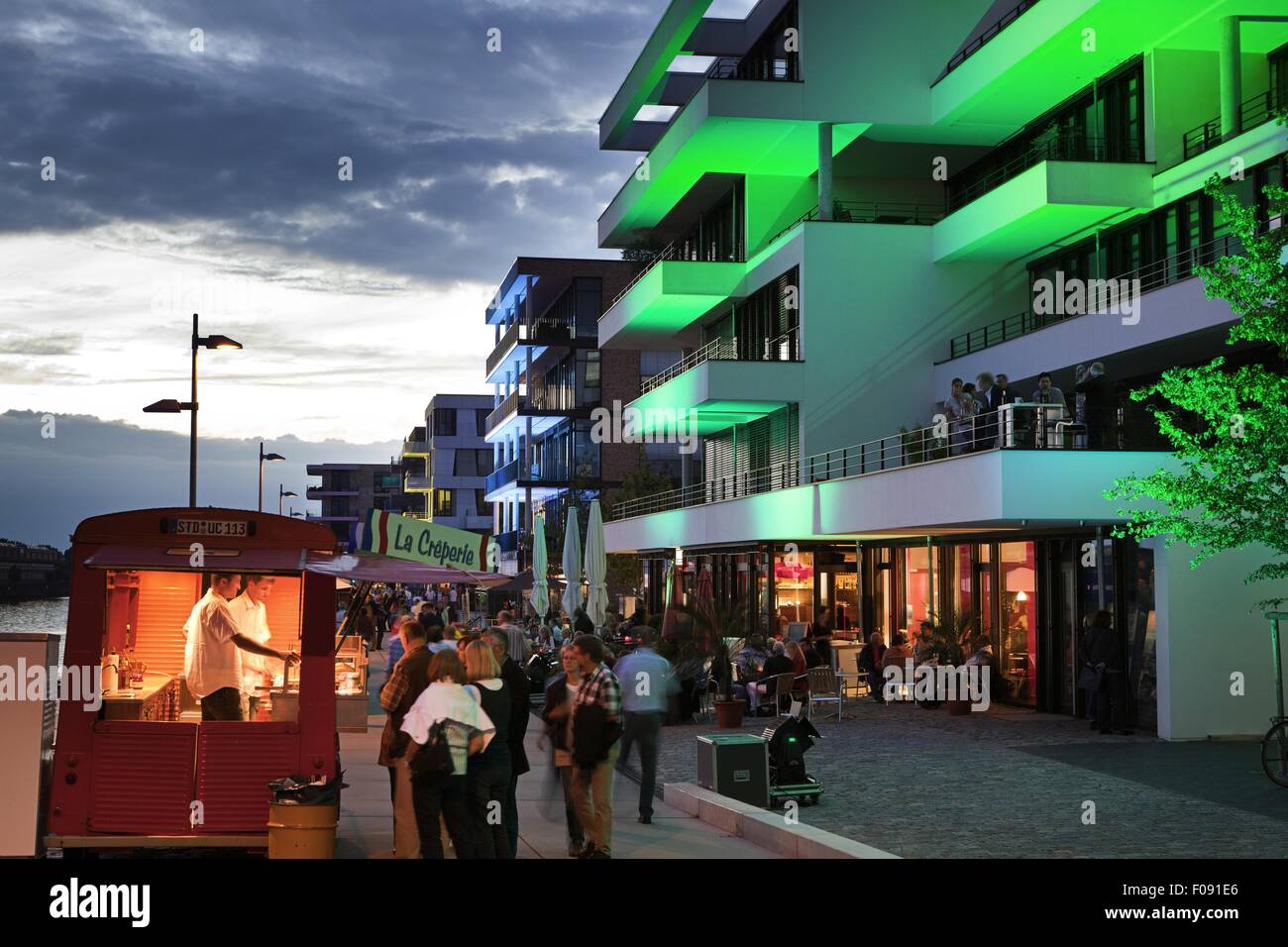 People at illuminated promenade in Bremen, Germany Stock Photo - Alamy