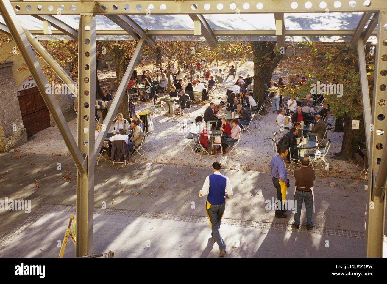 People at beer garden in the courtyard of Augustiner Brau, Salzburg ...