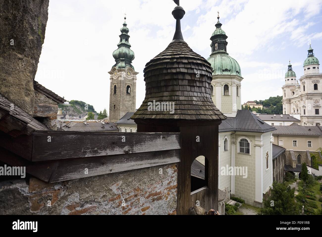 Catacombs overlooking clock tower at Salzburg, Austria Stock Photo - Alamy