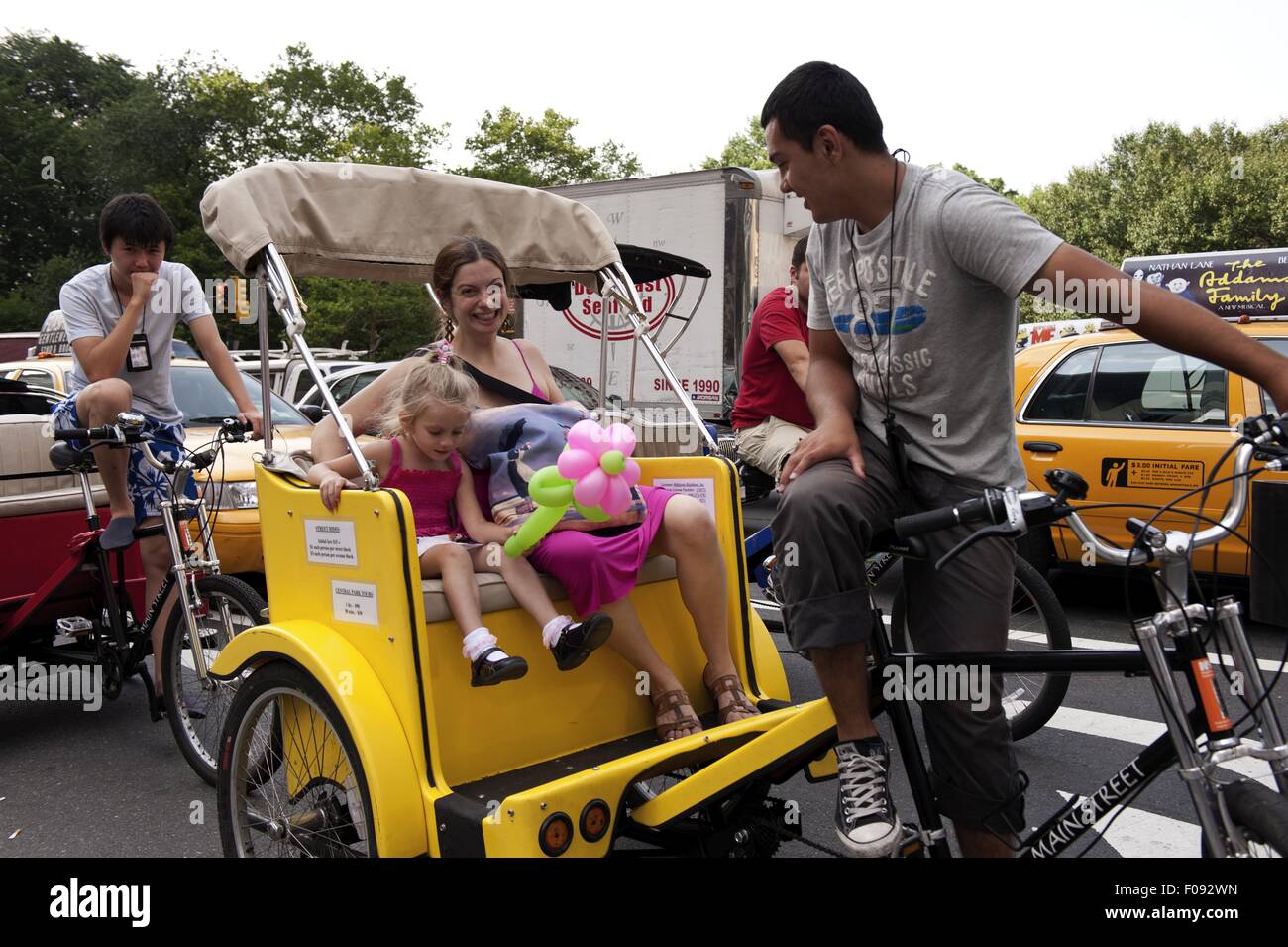 Children ride cycle rickshaw hi-res stock photography and images - Alamy