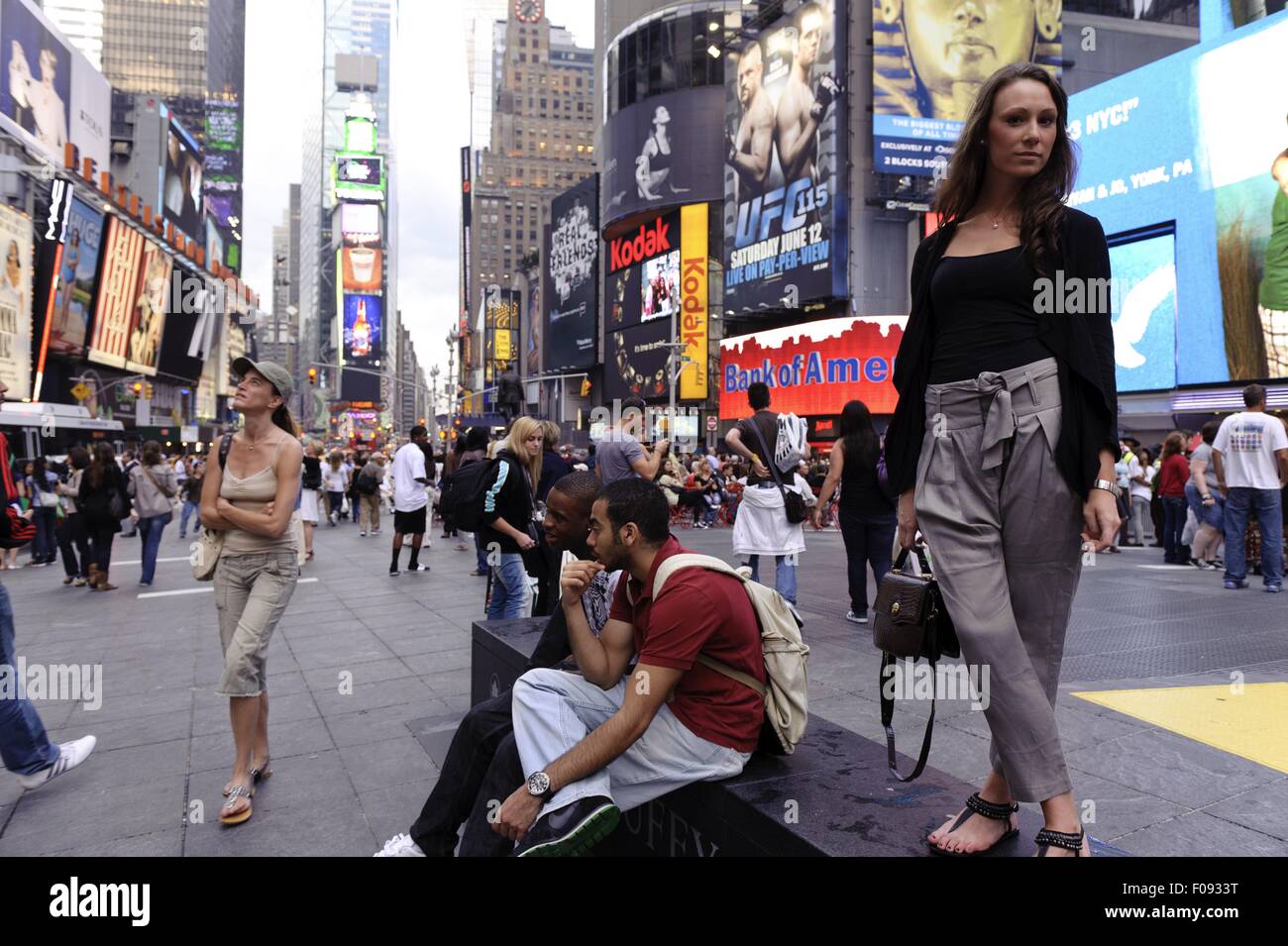 Woman posing at times square hi-res stock photography and images - Alamy