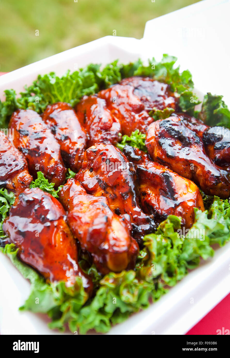 Fresh BBQ chicken wings in a presentation box Stock Photo - Alamy