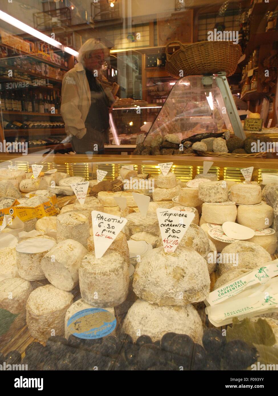 Various cheese with price tags in shop, Ile Saint-Louis, Paris, France ...