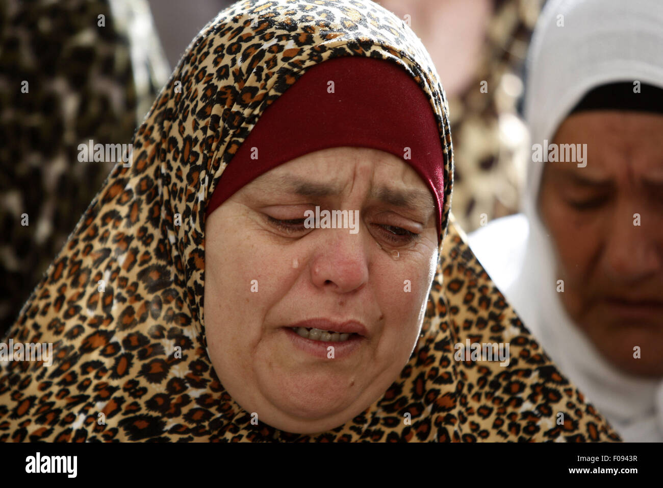 Ramallah, West Bank, Palestinian Territory. 10th Aug, 2015. A relative ...