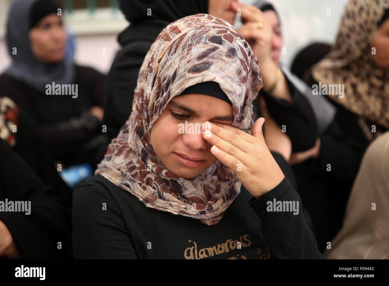 Ramallah, West Bank, Palestinian Territory. 10th Aug, 2015. A relative ...