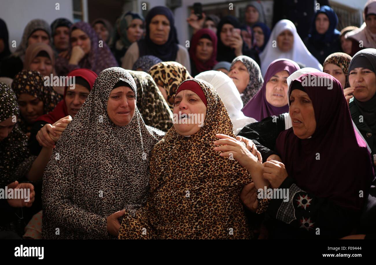 Ramallah, West Bank, Palestinian Territory. 10th Aug, 2015. Relatives ...