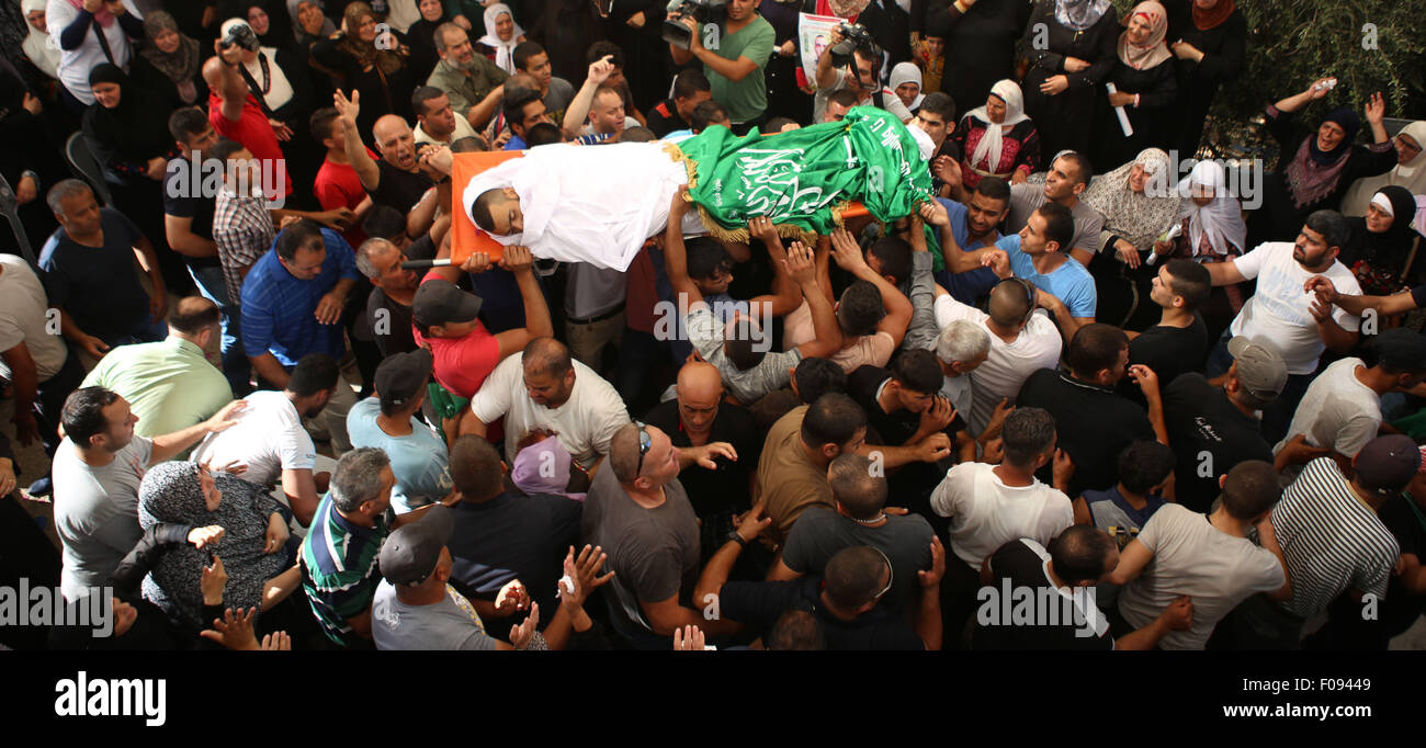 Ramallah, West Bank, Palestinian Territory. 10th Aug, 2015. Mourners ...