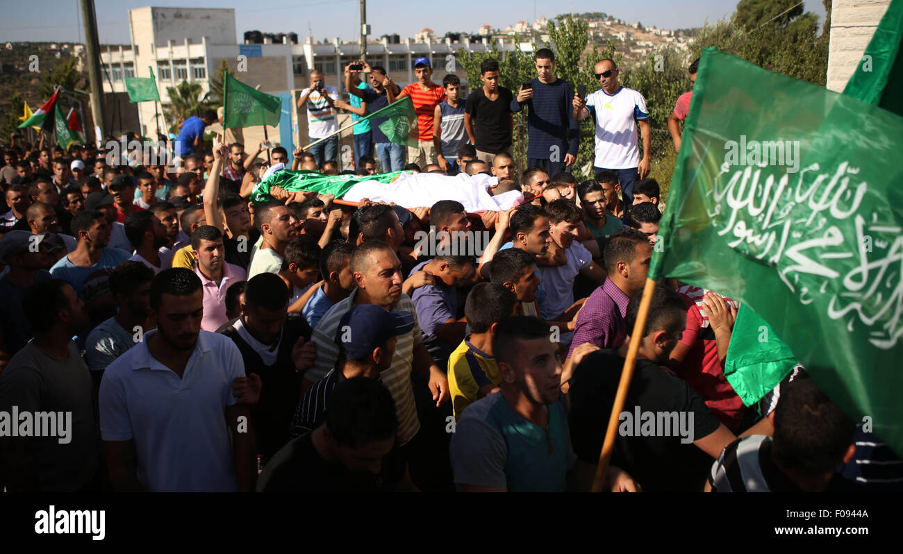 Ramallah, West Bank, Palestinian Territory. 10th Aug, 2015. Mourners ...