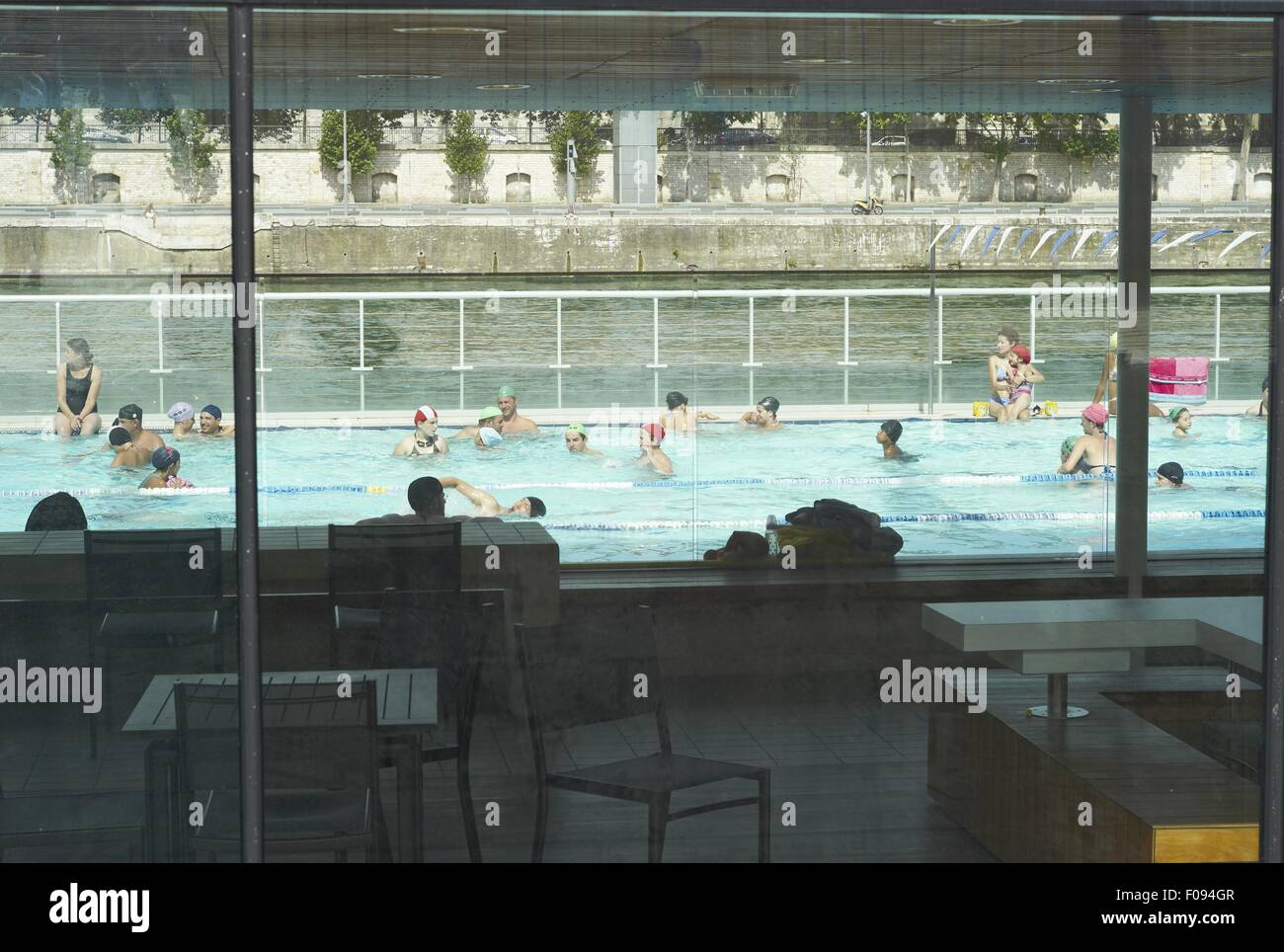 People at outdoor swimming pool on Seine river, Paris, France Stock ...