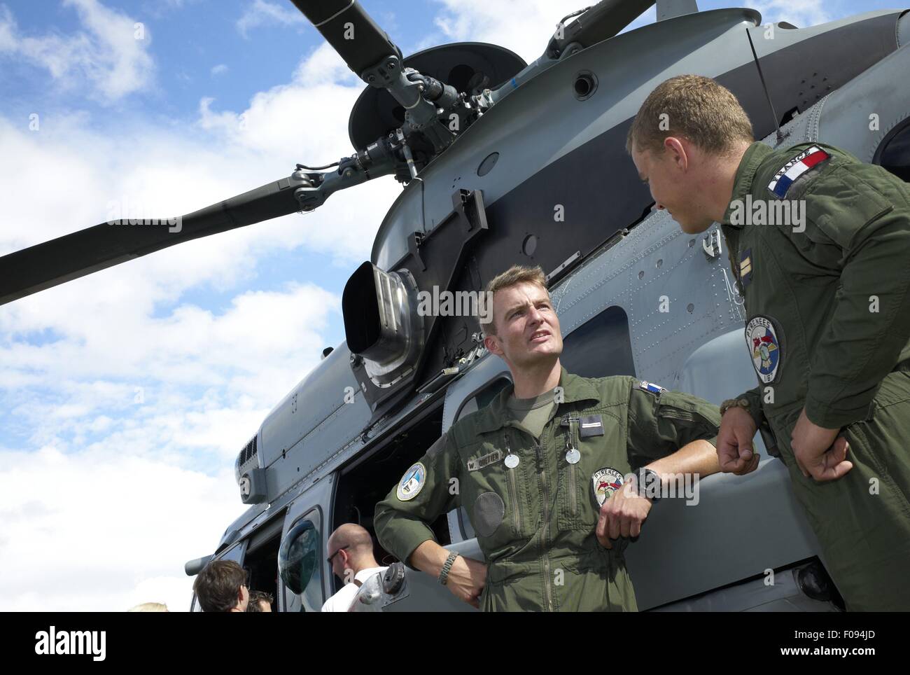 Soldiers talking while standing in front of helicopter in Paris, France ...