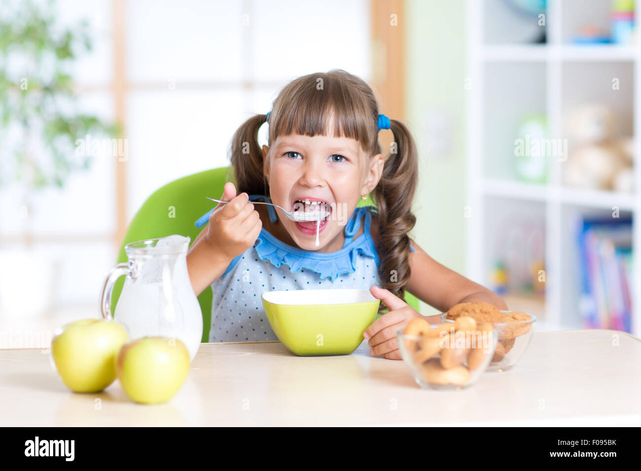 child eating healthy food at home Stock Photo - Alamy
