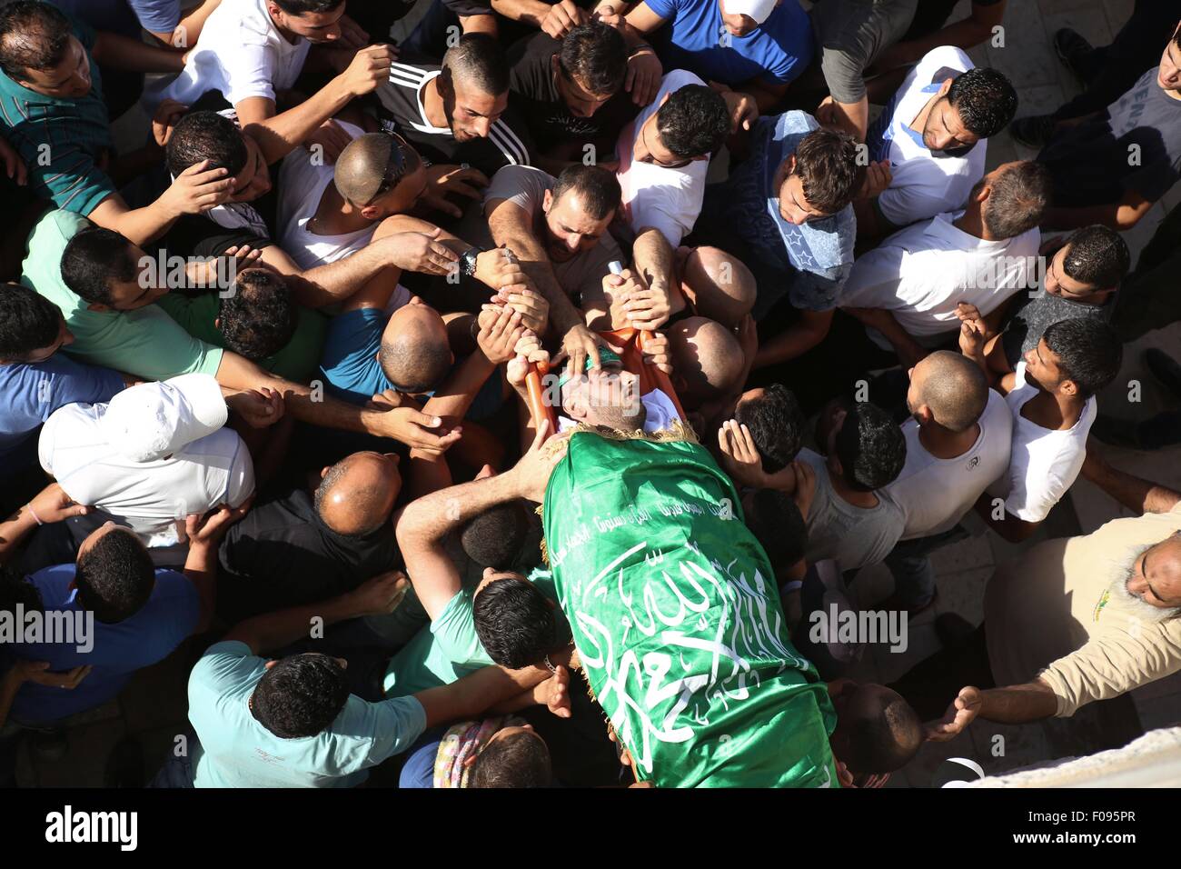 Ramallah, West Bank, Palestinian Territory. 10th Aug, 2015. Mourners ...