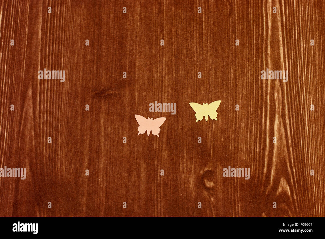 butterfly of paper on wood texture Stock Photo - Alamy