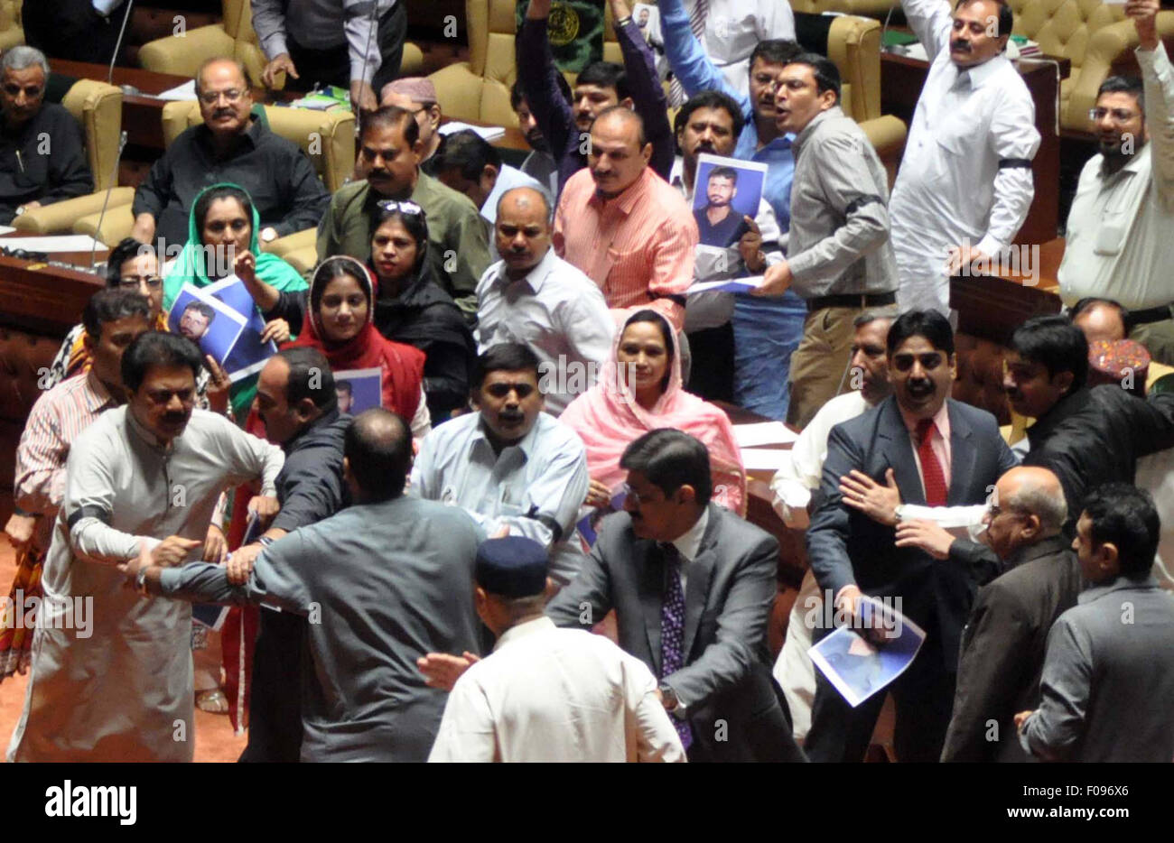MQM members of Sindh Assembly are protesting against extra judicial ...