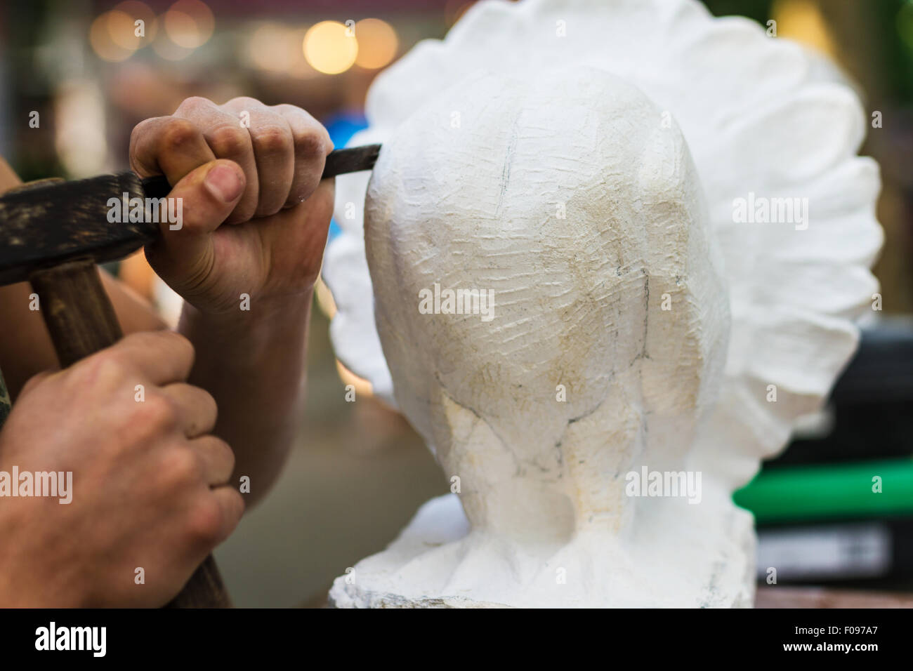 Young student at work learning craftsman profession in art class ...