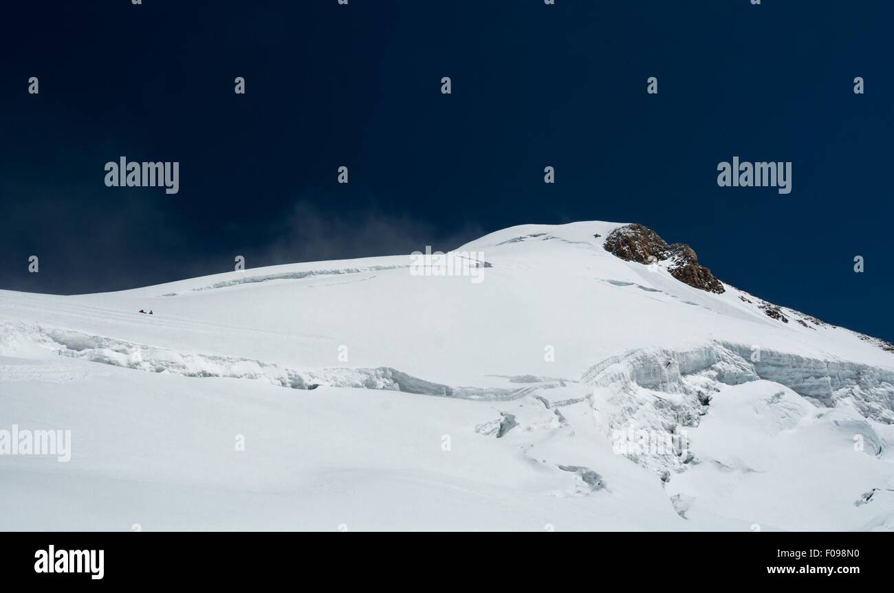 Mountain ridge covered with snow Stock Photo - Alamy