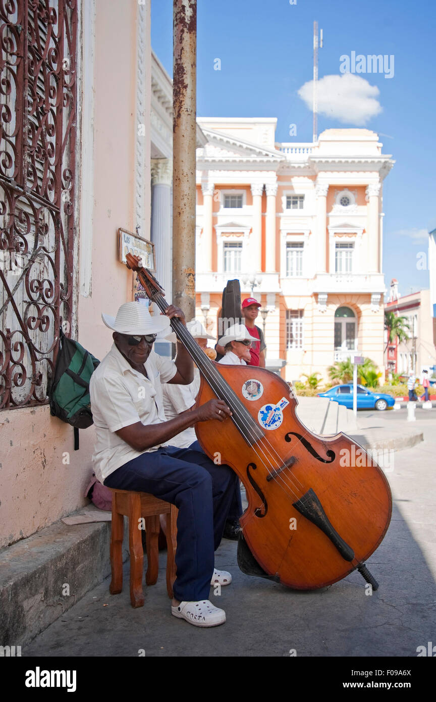 Vertical view of a typical salsa group busking on the streets of ...