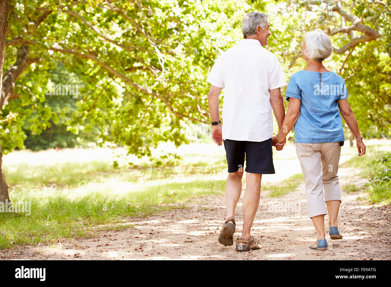 Back view man walking other hi-res stock photography and images - Alamy