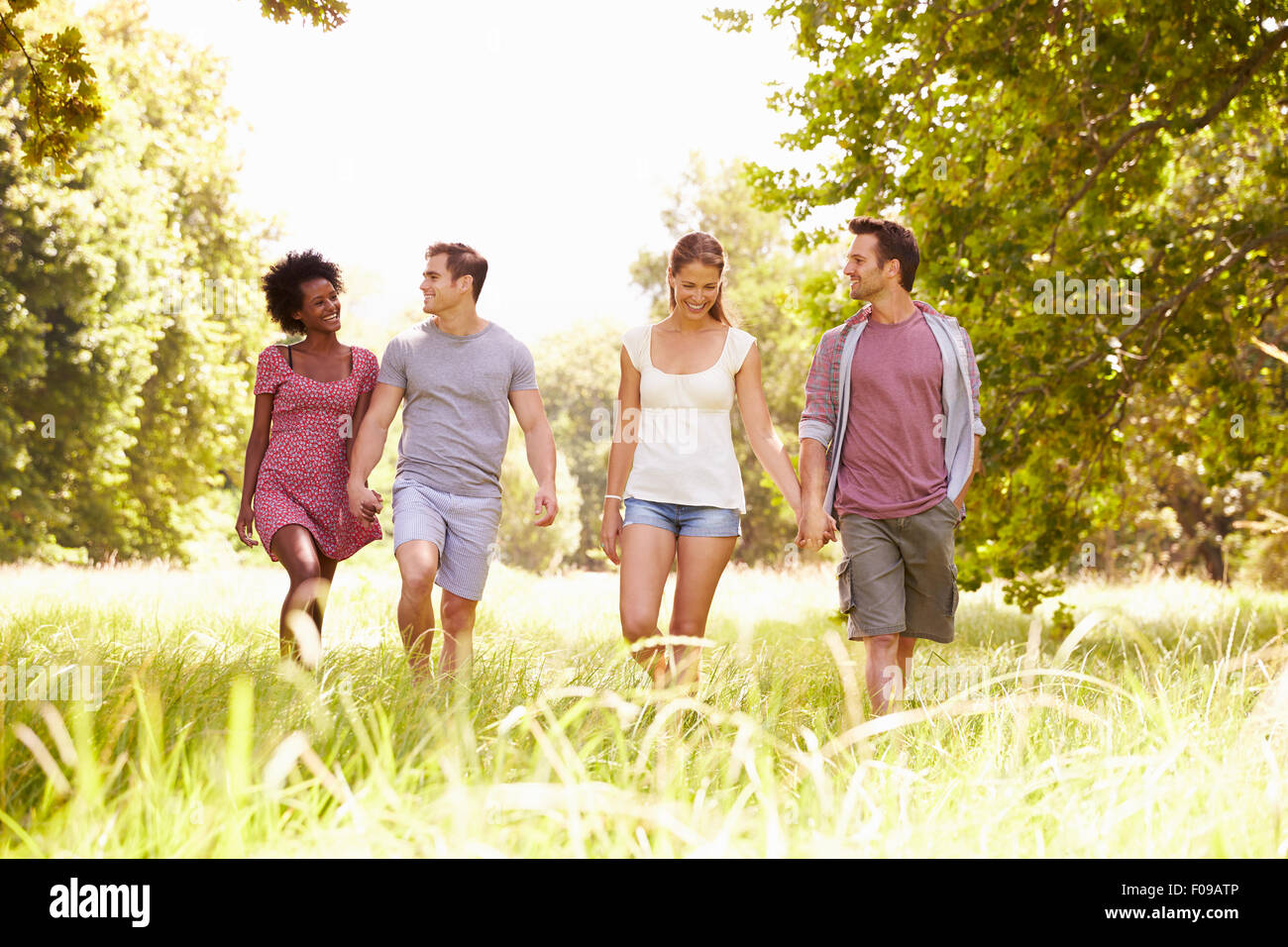 Friends couples walking talking hi-res stock photography and images - Alamy