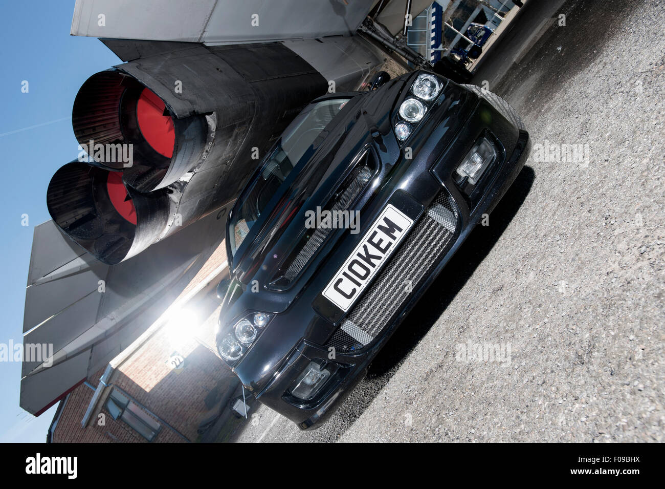 Modified Mk3 Vauxhall Astra car parked under a Concorde airliner Stock ...